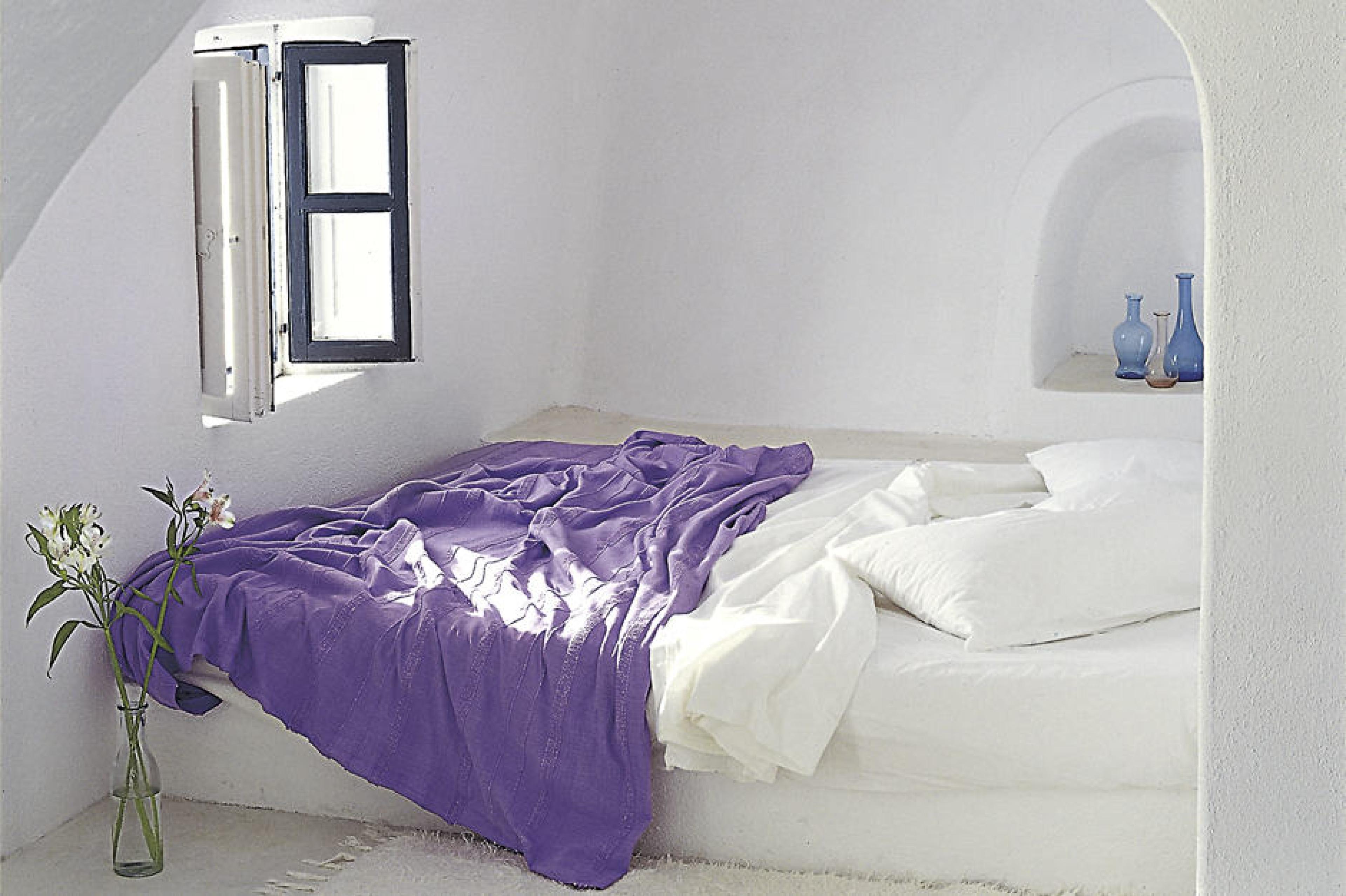 Best Santorini Hotels | Luxury Stays Curated by Indagare